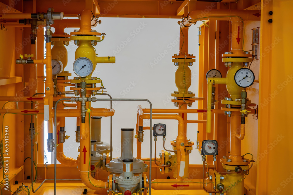 Gas control cabinet. Yellow pipes with manometers. Gas control ...