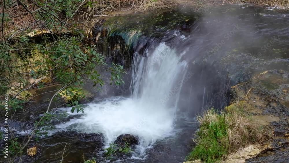 Flowing hot water stream river with cascades from sulphuric hot spring ...