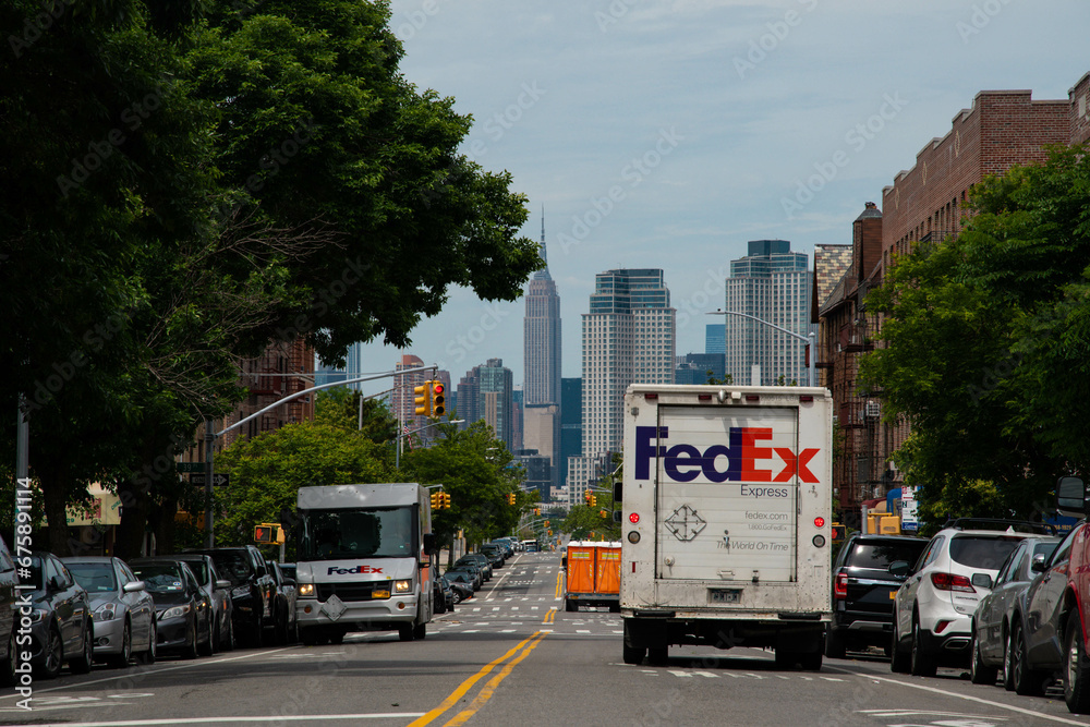 Fedex truck delivering on NYC streets, copy space background image ...