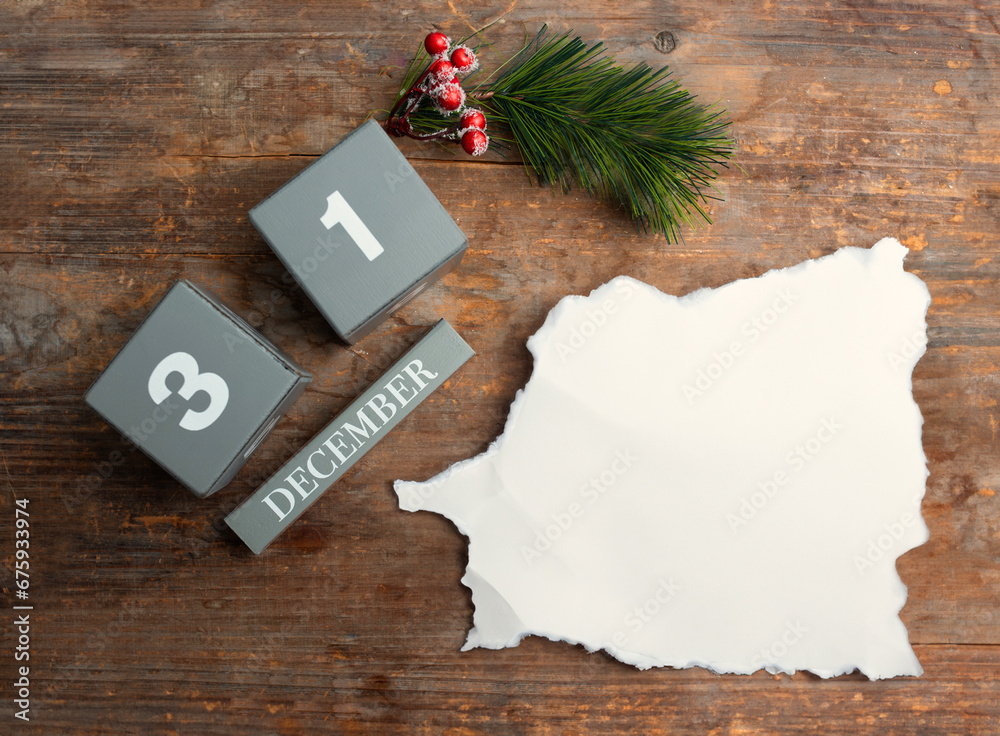 December 31st. wooden calendar with the date December 31 with New and a ...