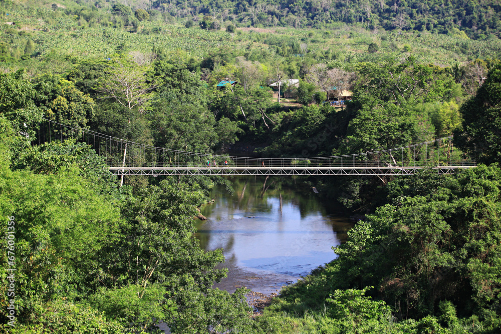 Steel wire rope suspension bridge spanning the Phetchaburi River, Baan ...