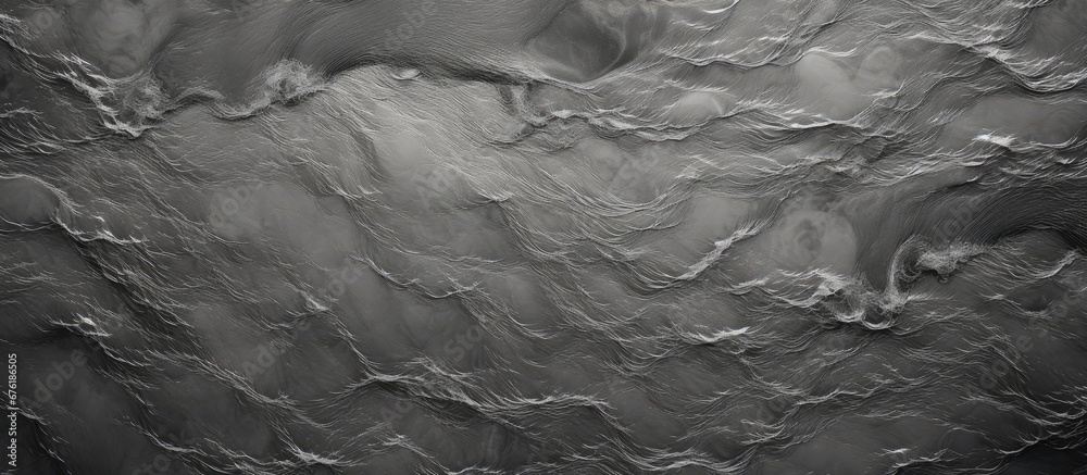 The old rough textured river surface with its abstract black and white ...