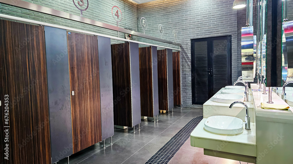 Row of public toilet modern design interior, Modern Public Restroom ...