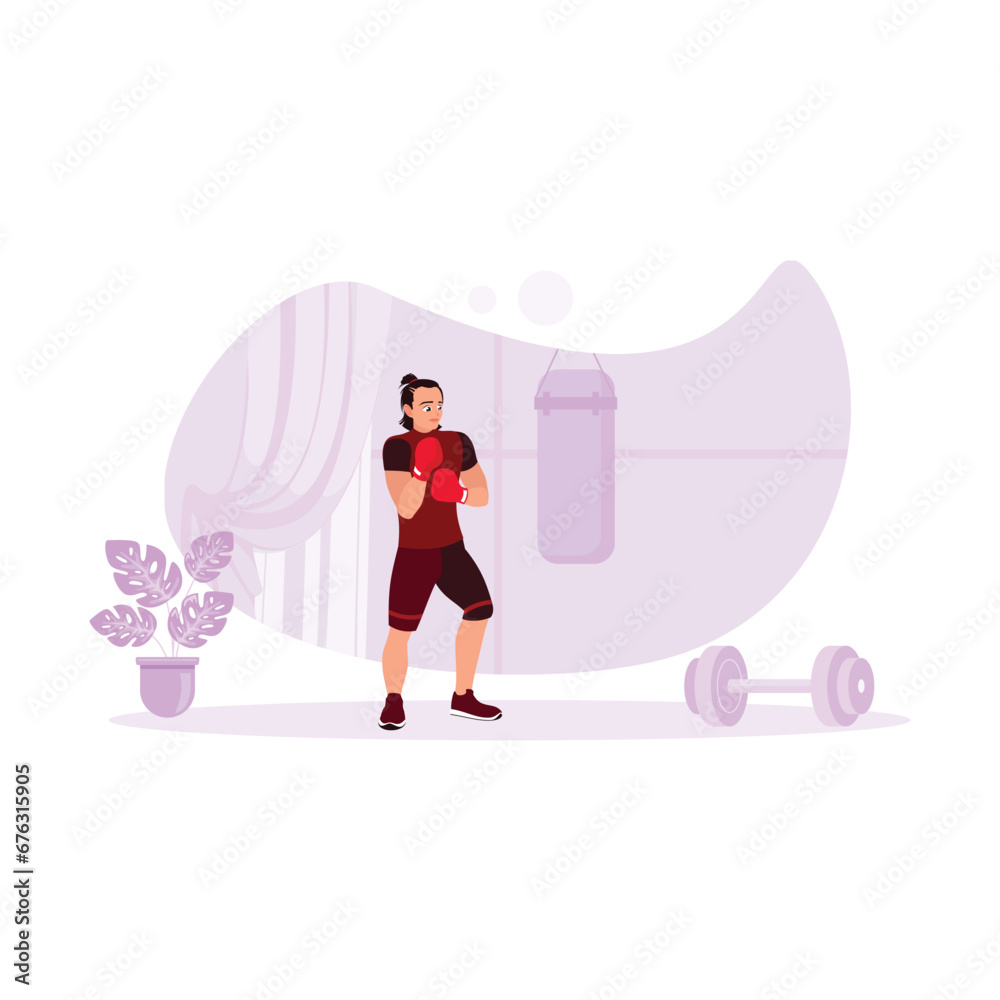 Professional boxer training in a modern gym hall. Muscular athletes ...