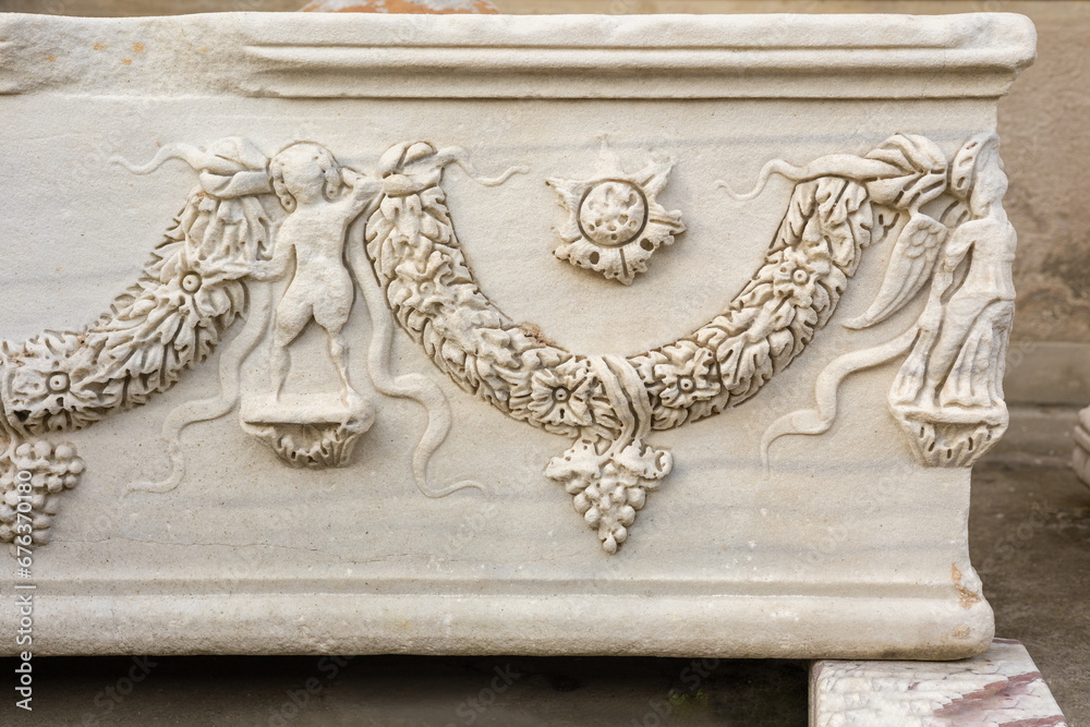 Old plaster sculptures and bas-reliefs, wall texture and patterns ...