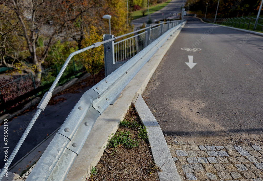 Reinforcement of the edge of the road with a concrete wall on which ...
