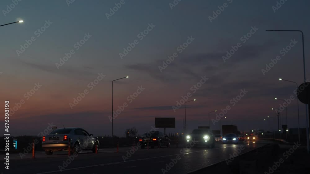 Cars Buses Minibuses Trucks with Shining Headlights Driving on the ...