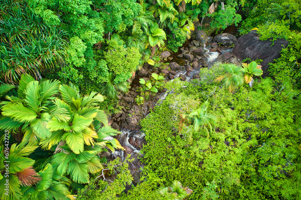 Drone photgraphy of the upper part of Sauzier waterfall on, surrounded ...