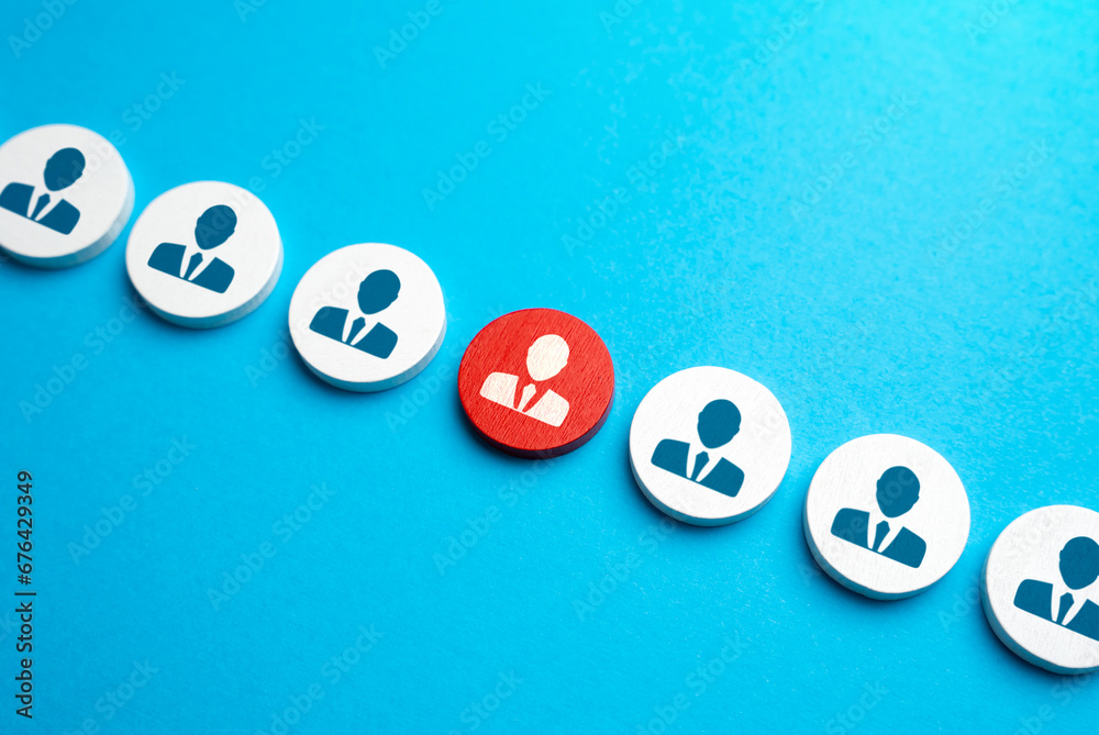 Hiring new employees. Dismissal of a worker. Red highlighted person in ...