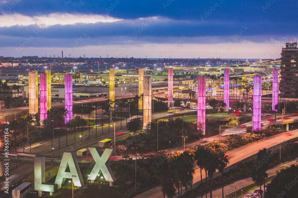 LAX Los Angeles International Airport welcome Sign and pylons at Night ...