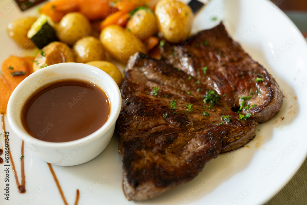 Dish in old bistro in Limoges, France, Limousin cattle beef steak ...