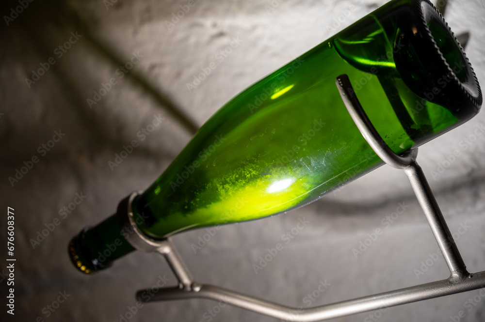 Sediment in bottle. Production of cremant sparkling wine in south part ...