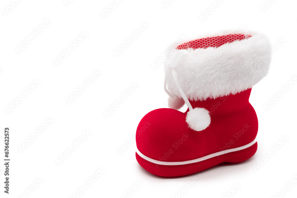 Little Red boot of Santa Claus with a white fur isolated on white ...