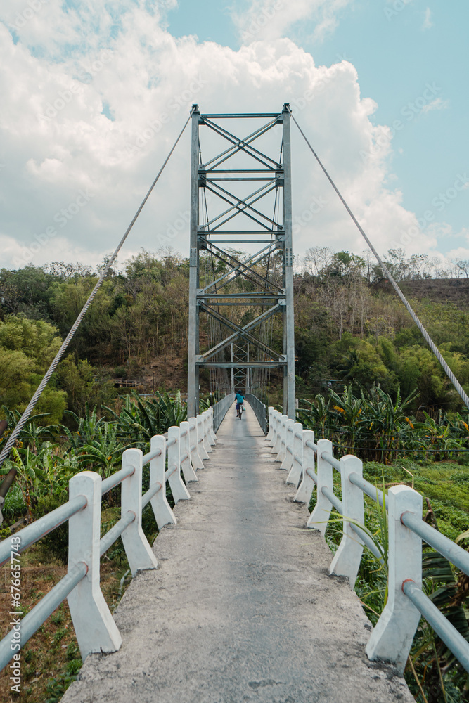 A suspension bridge that can only be used by two-wheeled vehicles and ...