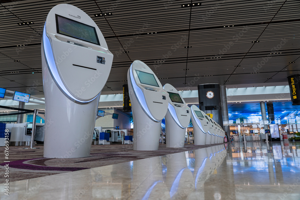 Changi Airport, Singapore, Self-service check-in facilities at Terminal 1, Changi Airport Stock ...