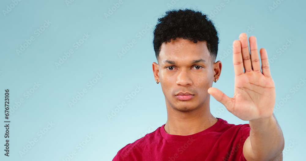 Man, hand and stop in studio portrait with forbidden warning, rejection ...