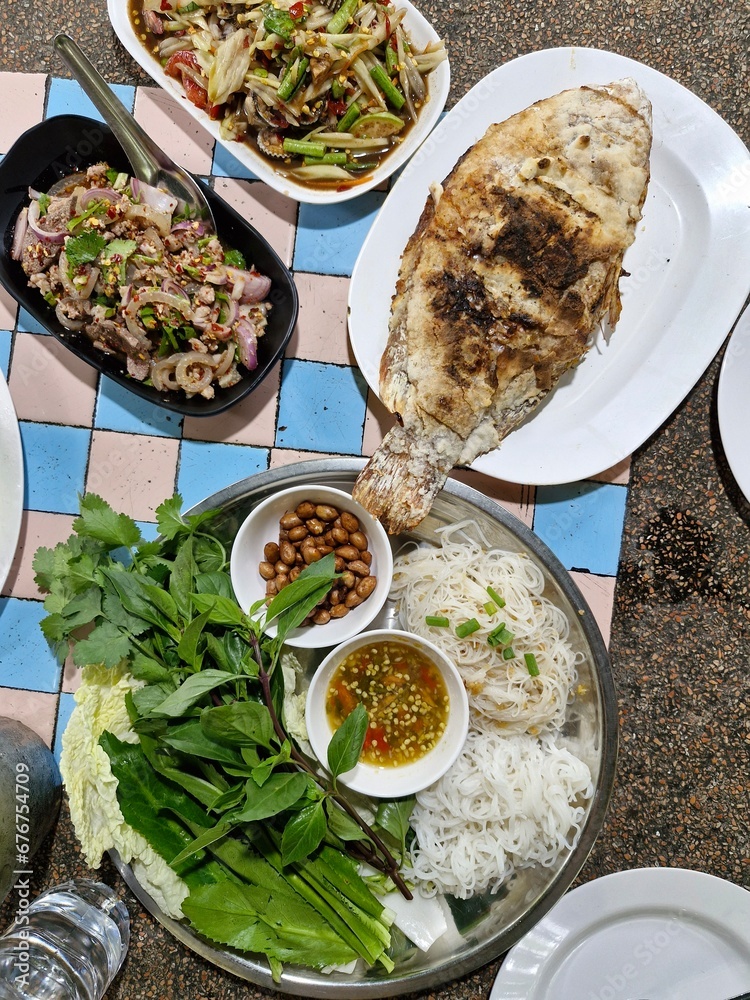 Foto de Thai food on the table, Northeastern Thai Dishes consist of ...
