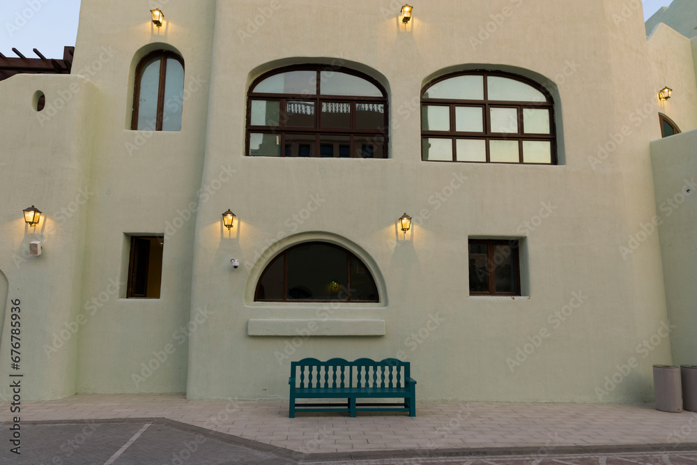 The colorful buildings in old doha port , which is one of the tourist ...