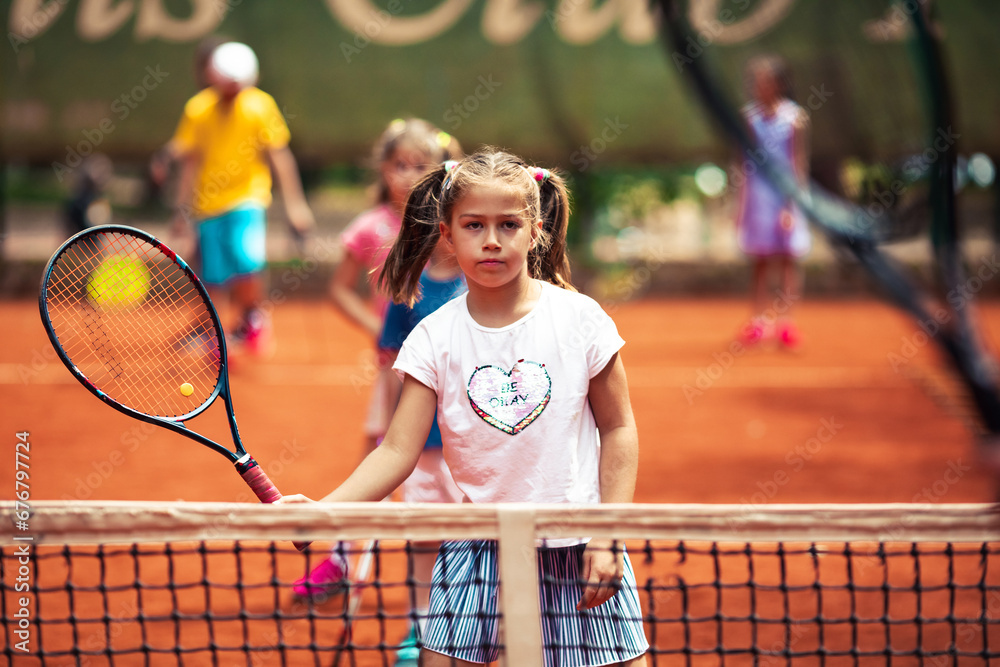 Young girl tennis player ready to hit forehand during practice Stock ...