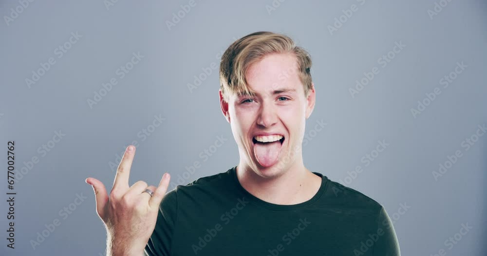 Man, face and rocker hand in studio for head bang dance music, heavy ...