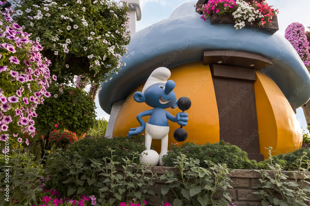 Fairy tale village of Smurfs with big dolls of Smurfs characters in the ...