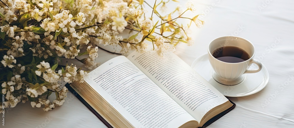 Christian themed table setting with Bible coffee cup flowers and room ...