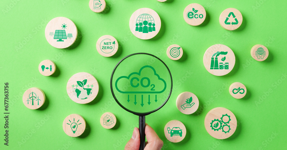 Magnifying glass with reduce CO2 emission concept, Environment icons decrease CO2, Reduction ...
