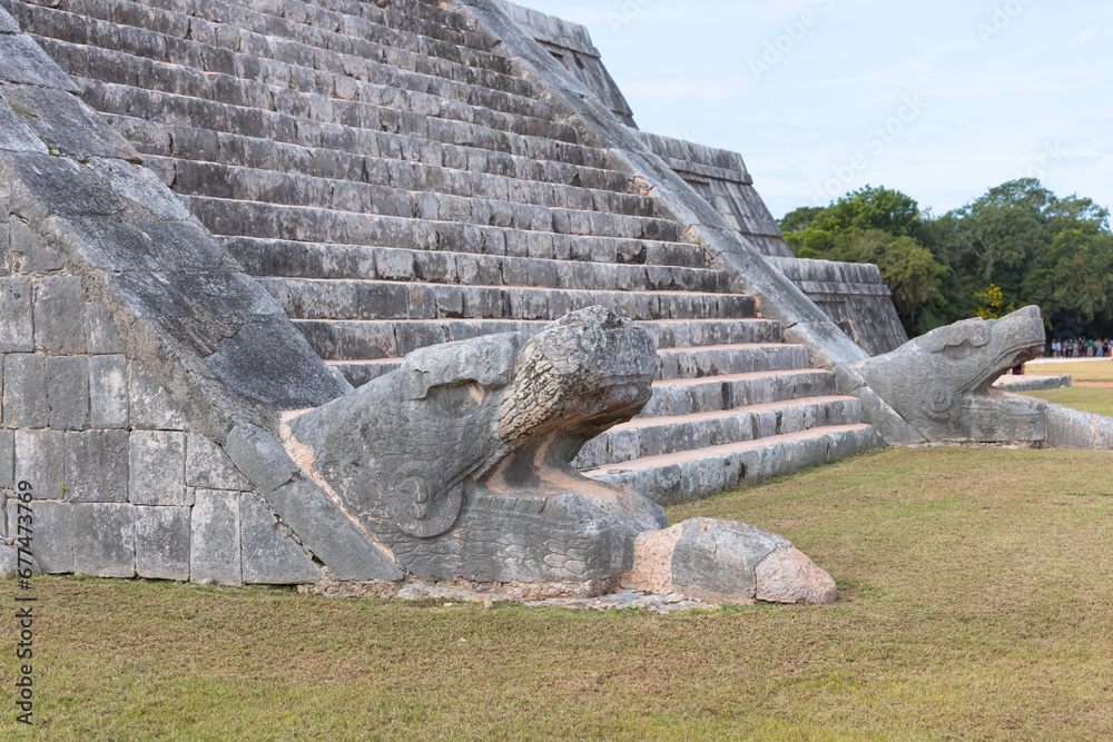 Two large snake heads carved from stone at the ancient Mayan ruins at ...