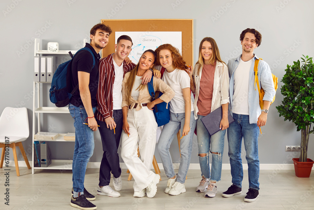 Full size photo of school friends in modern classroom. Classmates ...