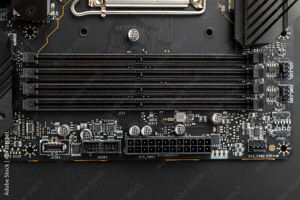 24 pin ATX power connector, DDR5 contacts on the motherboard on black ...