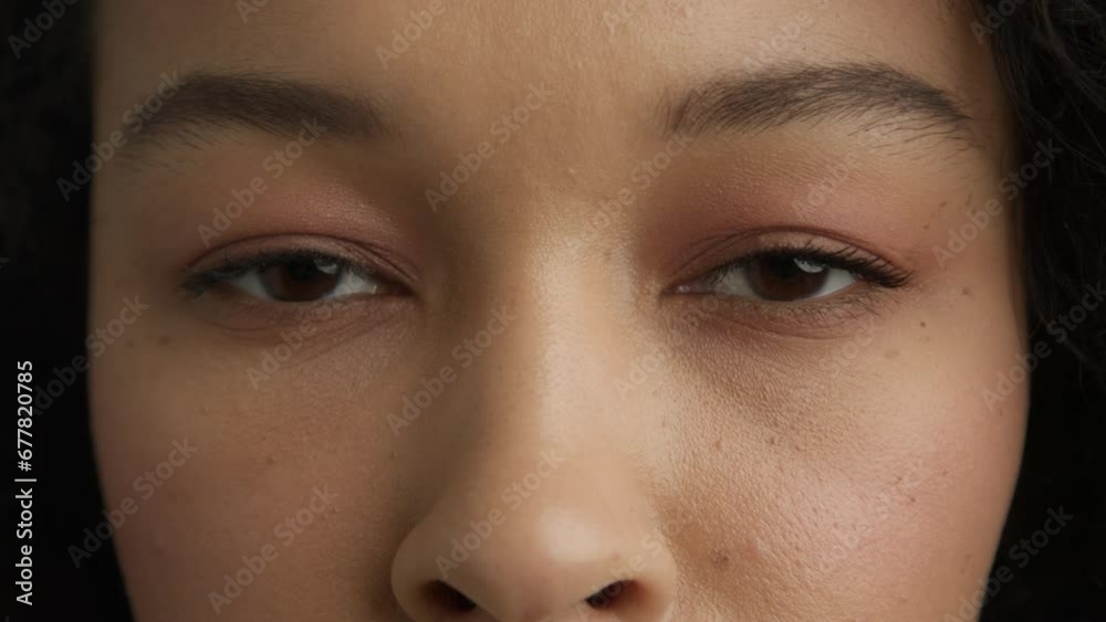 Gorgeous woman with multi ethnical eye shape in slow motion. Close up ...