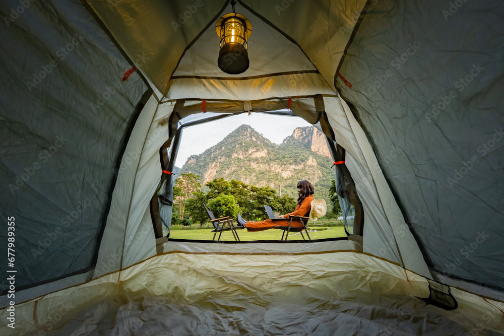 View from inside a tent with Hanging lamp on the top of the tent and ...