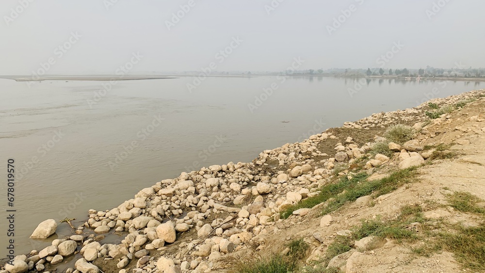 Sindh River view in punjab pakistan. Rocks in stream with smooth ...