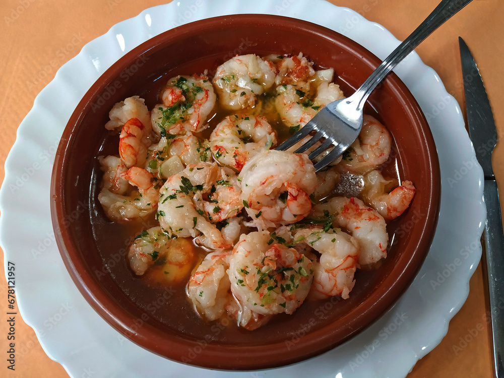 Gambas al ajillo. Prawns with garlic sauce. Typical dish from Spain ...