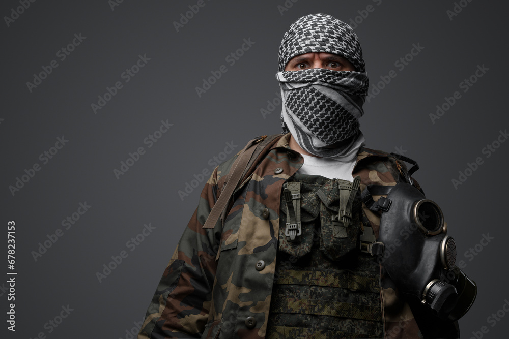 Middle Eastern radical fanatic soldier donning a white keffiyeh and ...