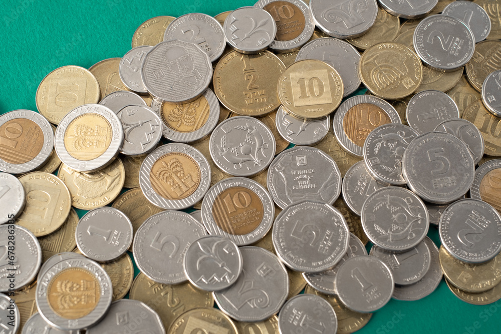 Israel's new shekel (NIS) coins in heap. Israel currency Money cash ...