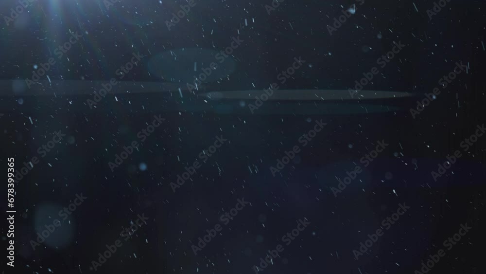 Real snow on black background, blue lighting, lens flare, blizzard ...