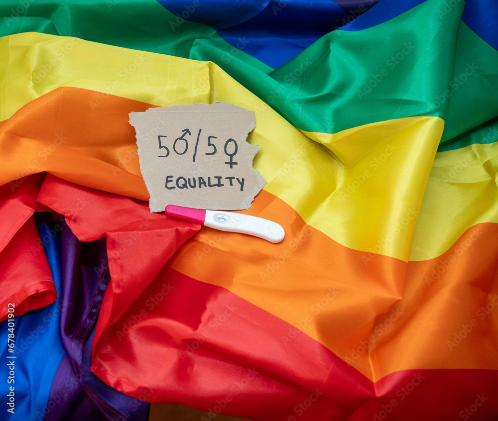 cut-out with the phrase 50 percent equality, on a pride flag along ...