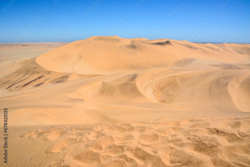 Desert dry landscape with sand dunes under blue sky. Global warming and ...