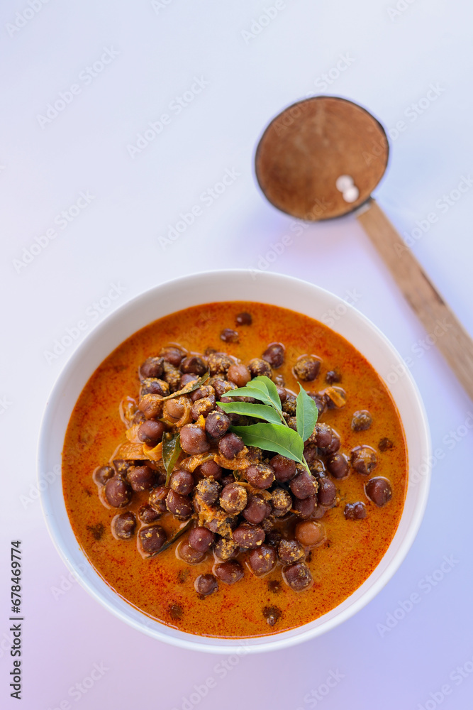 Bowl of delicious Kadala curry or chana masala curry or chick pea curry ...