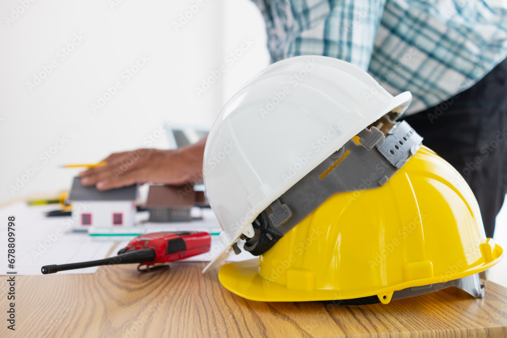 Yellow safety helmet were prepared for workers to wear before entering ...