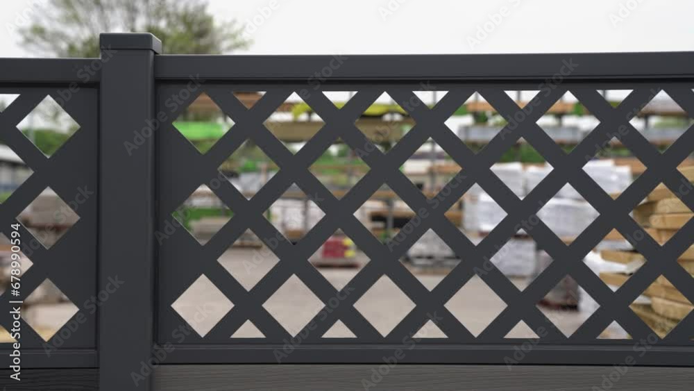 Close up of fence panel design with square diamond cut outs creating a ...