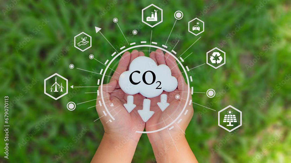 co2, in the hand environmental, emission, carbon,Lower CO2 emissions to ...