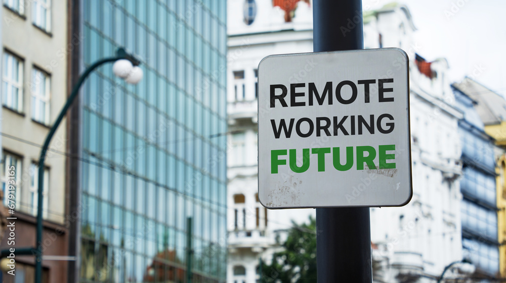 Flexible working future written on a sign in front of office buildings ...