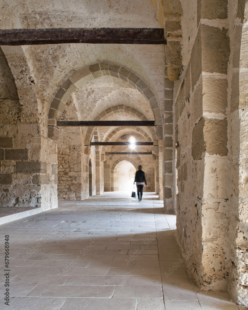 Ancient stone hallway in the Citadel of Qaitbay, Alexandria, Egypt. The ...