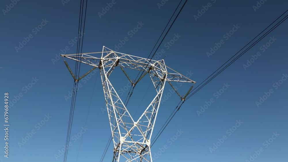 High voltage pylon for the transport of electricity and houses with ...