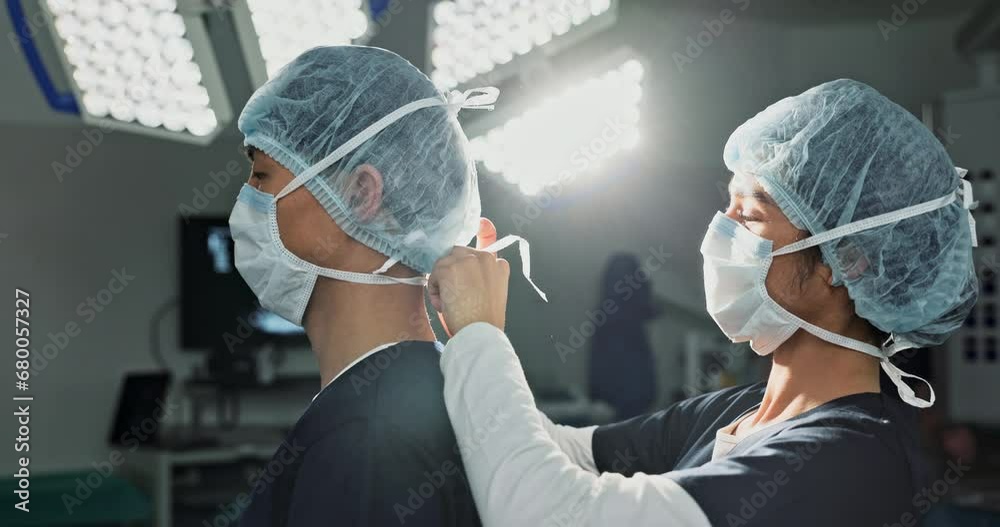 Surgery, hospital and doctors tie mask in operating room for medical ...