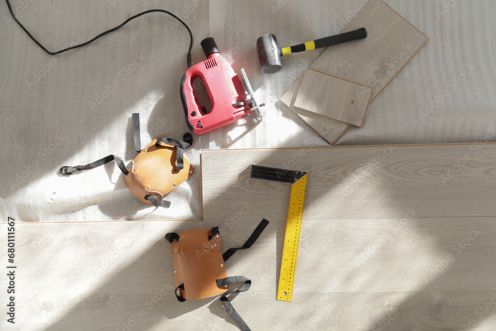 Rubber hammer, ruler with angle bar, tape meter, jig saw and other ...