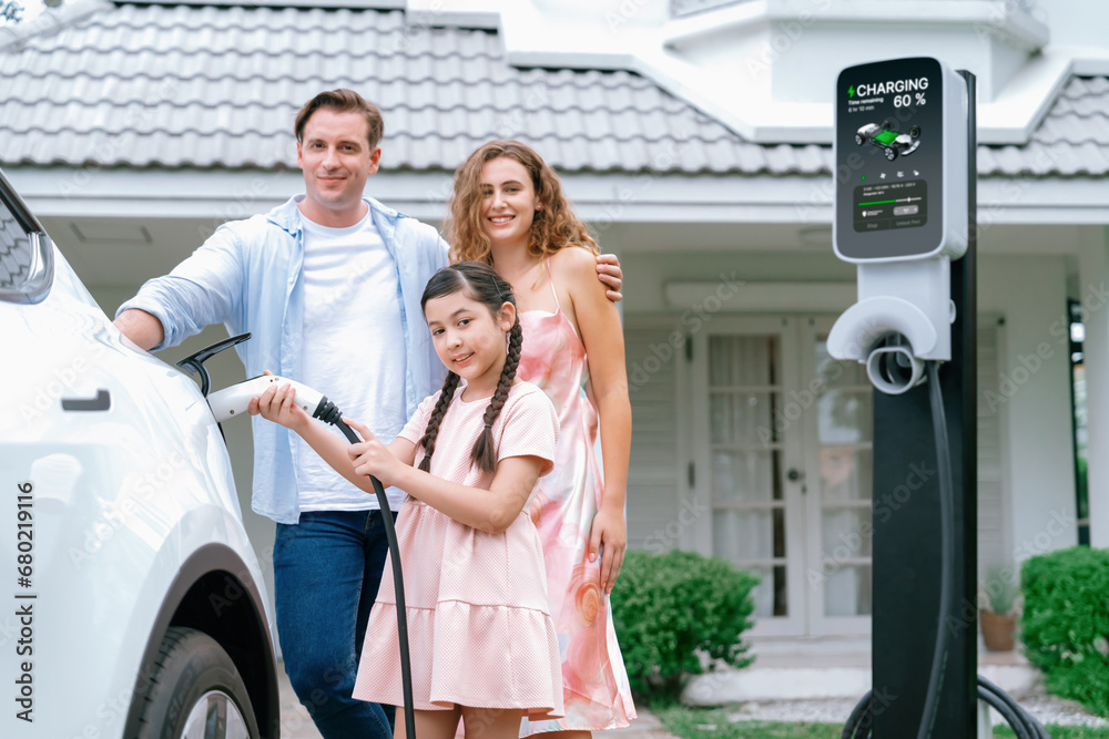 Happy little young girl learn about eco-friendly and energy ...