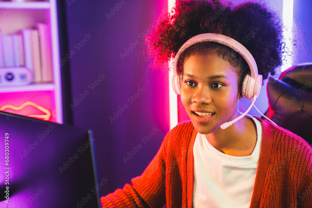 African American girl streamer playing online fighting with Esport ...